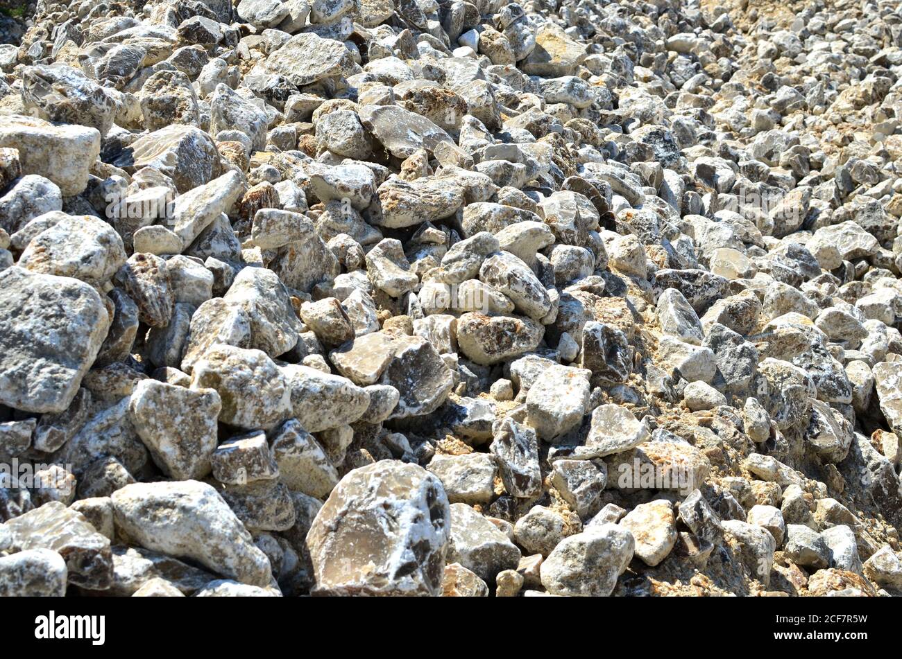 Natural gray gypsum stones. Gypsum stone is a soft sulfate mineral ...