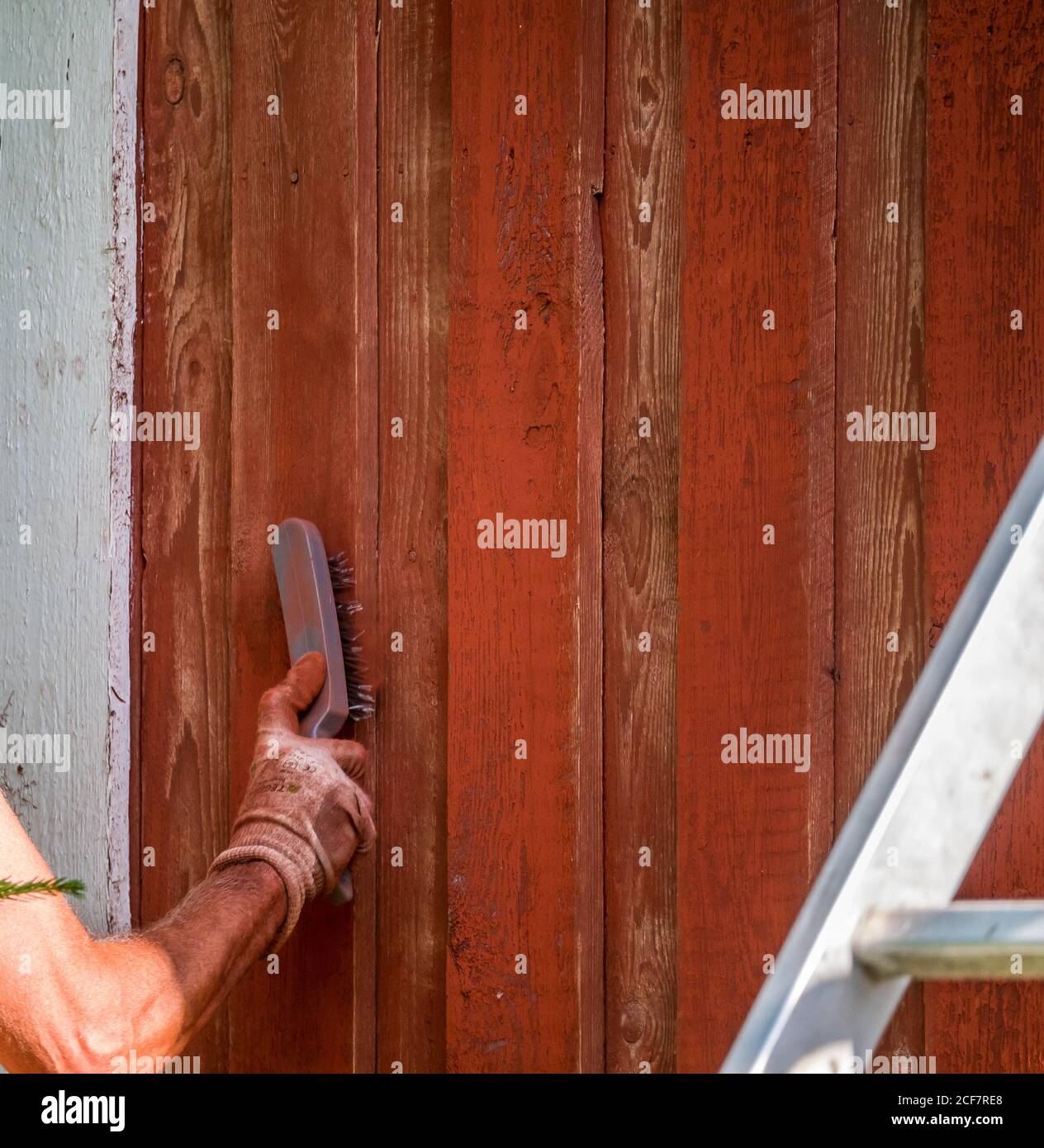 Removing old red color from house painted with Swedish falu red color ...
