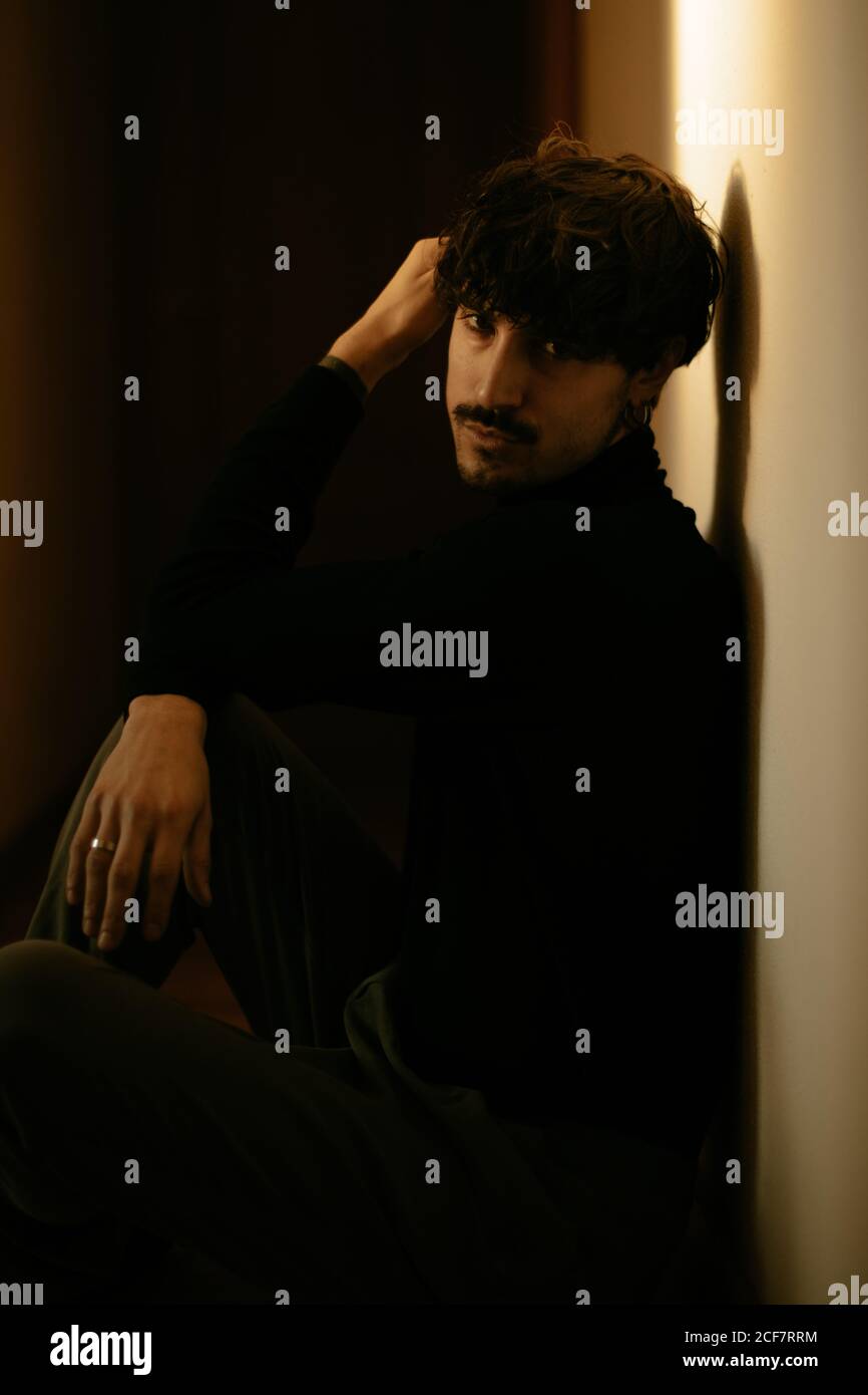 Man running hand through hair hi-res stock photography and images - Alamy