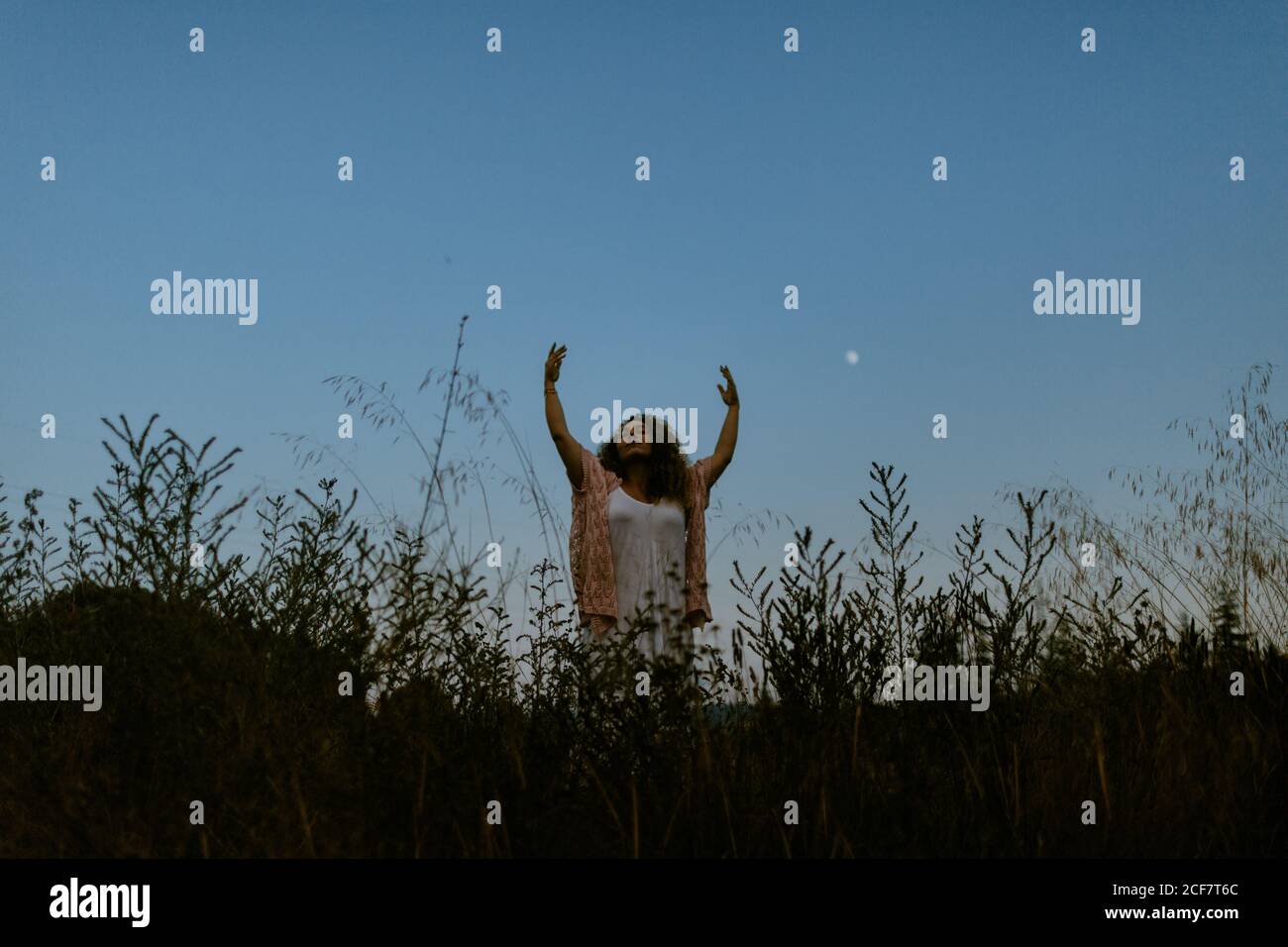 Woman raising arms High Resolution Stock Photography and Images - Alamy