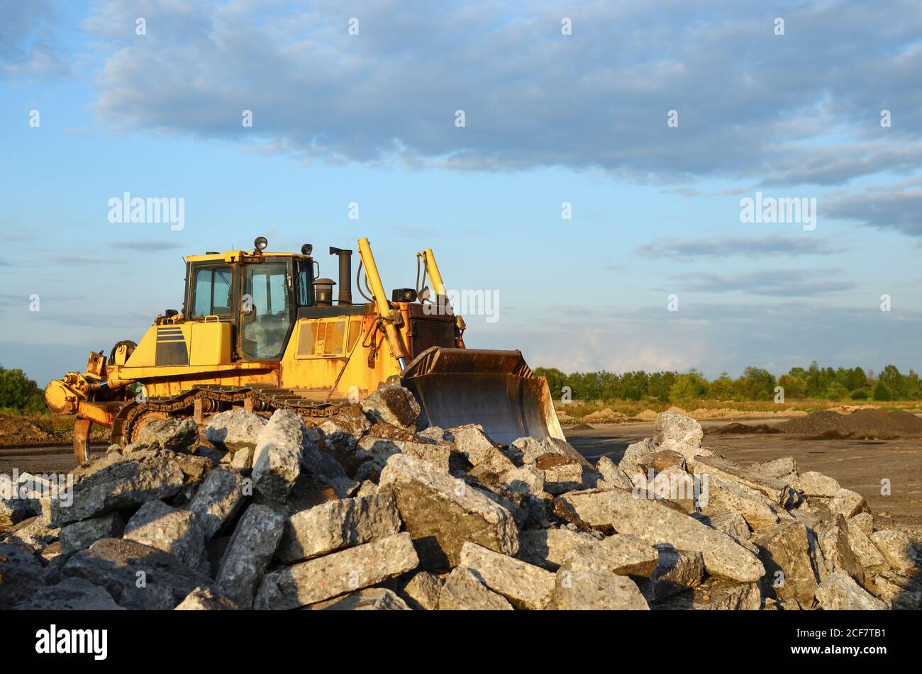 Bulldozer with bucket for pool excavation and utility trenching. Dozer ...