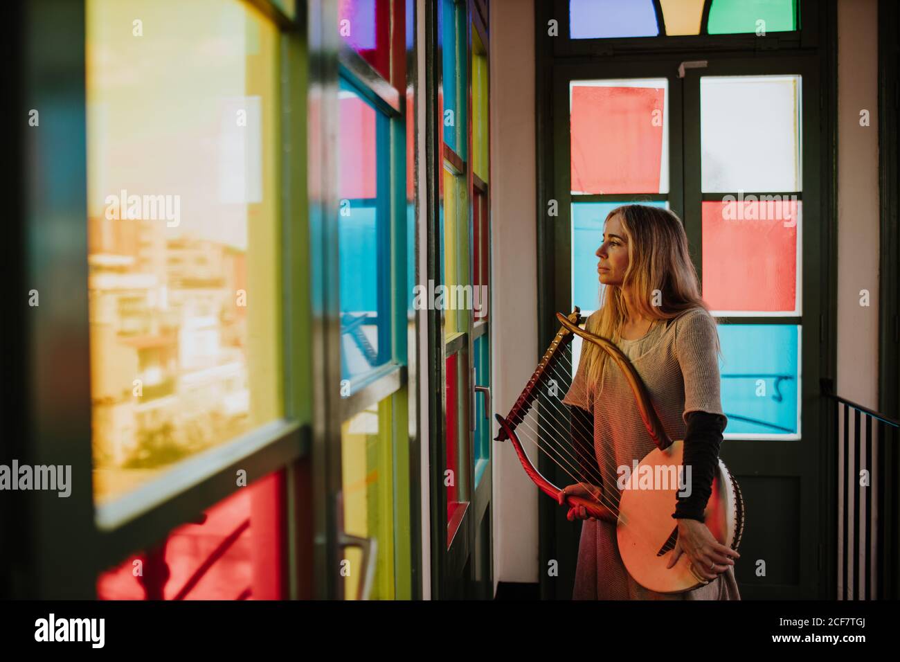 Stained glass window woman looking hi-res stock photography and images ...