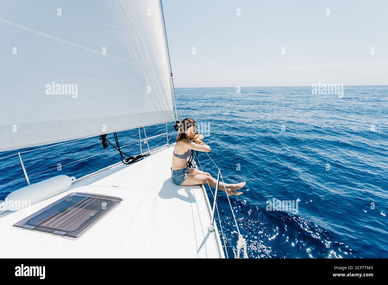 Woman on boat wearing bikini hi-res stock photography and images - Alamy