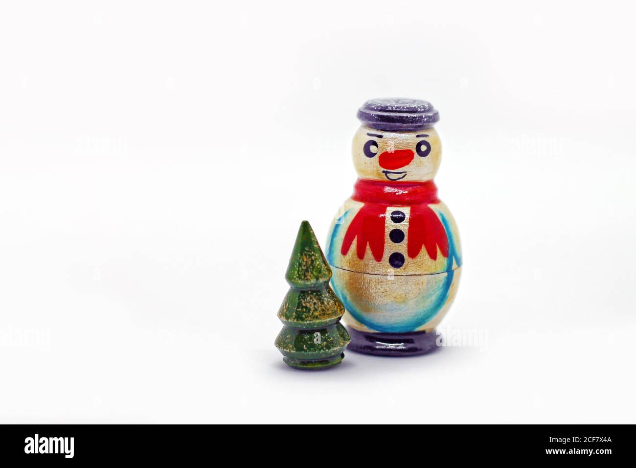 Traditional wooden russian toy. Nesting dolls - snowman and christmas ...