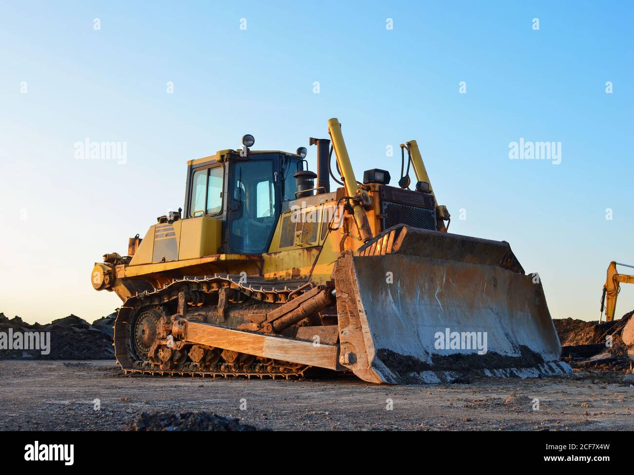 Dozer with bucket for pool excavation and utility trenching. Bulldozer ...