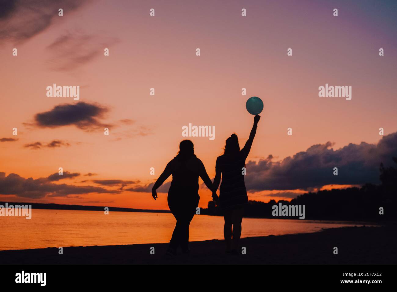 Hands holding balloon hi-res stock photography and images - Alamy