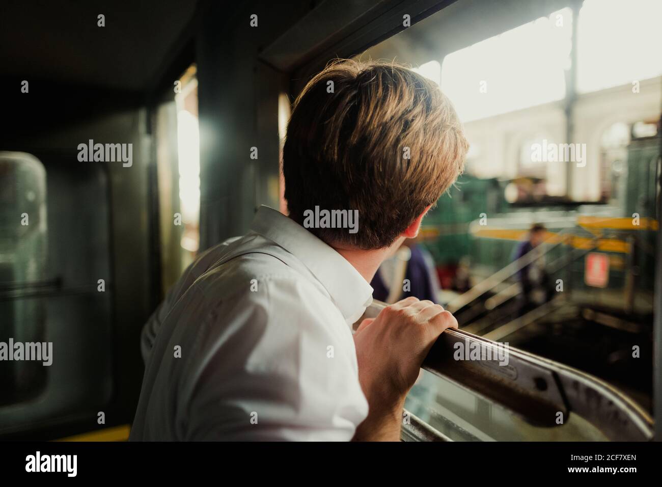 Traveler looking out train window Stock Photo - Alamy