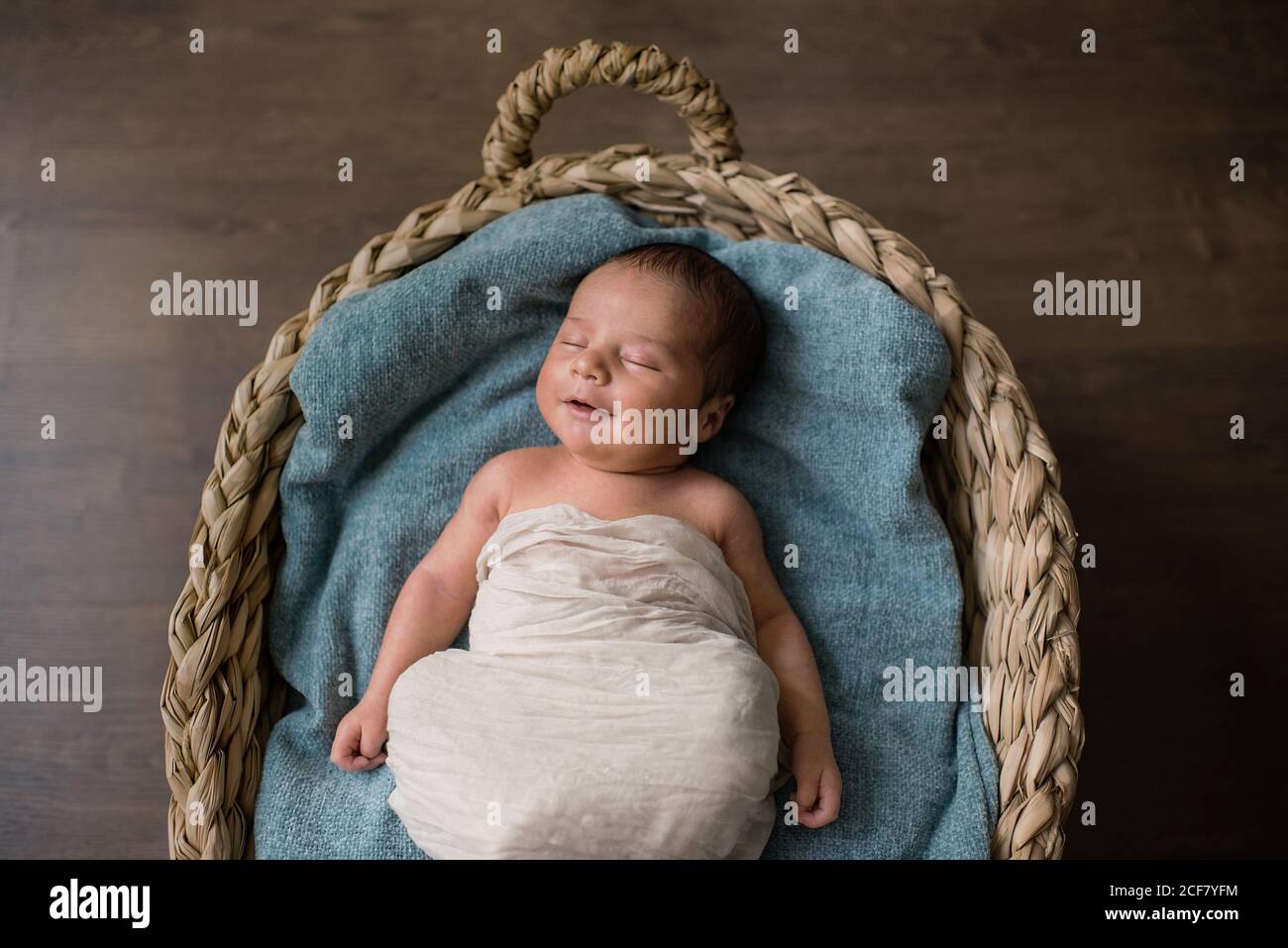 Newborn baby wrapped in cloth hi-res stock photography and images - Alamy