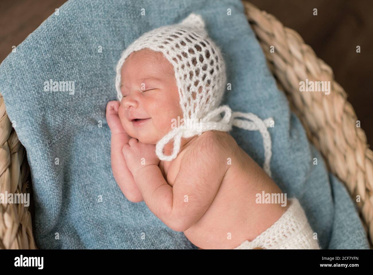 Newborn baby wrapped in cloth hi-res stock photography and images - Alamy