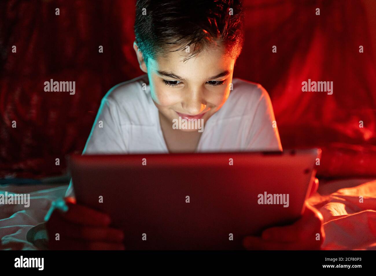 Kid hiding under blanket hi-res stock photography and images - Alamy