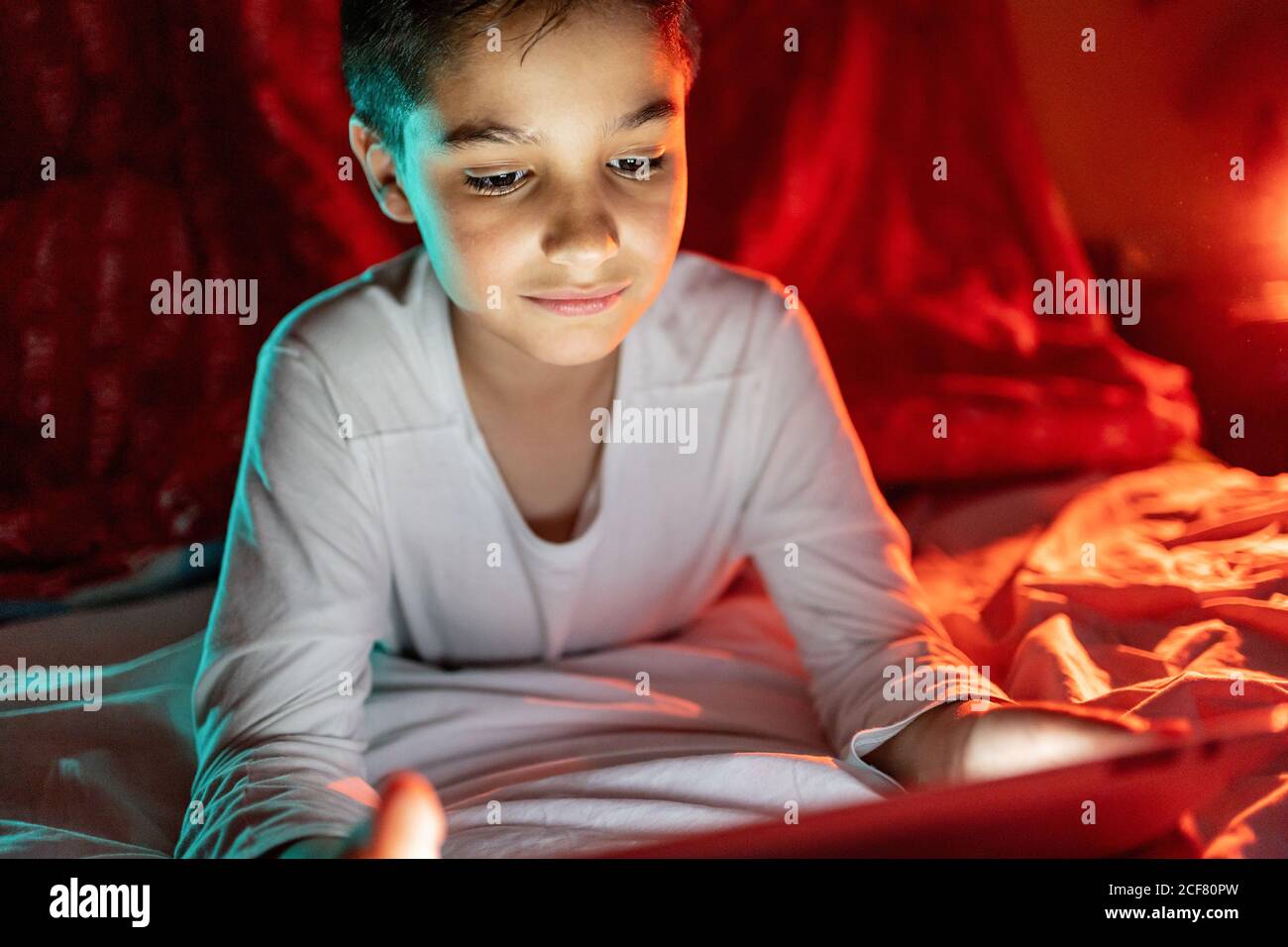 Kid hiding under blanket hi-res stock photography and images - Alamy