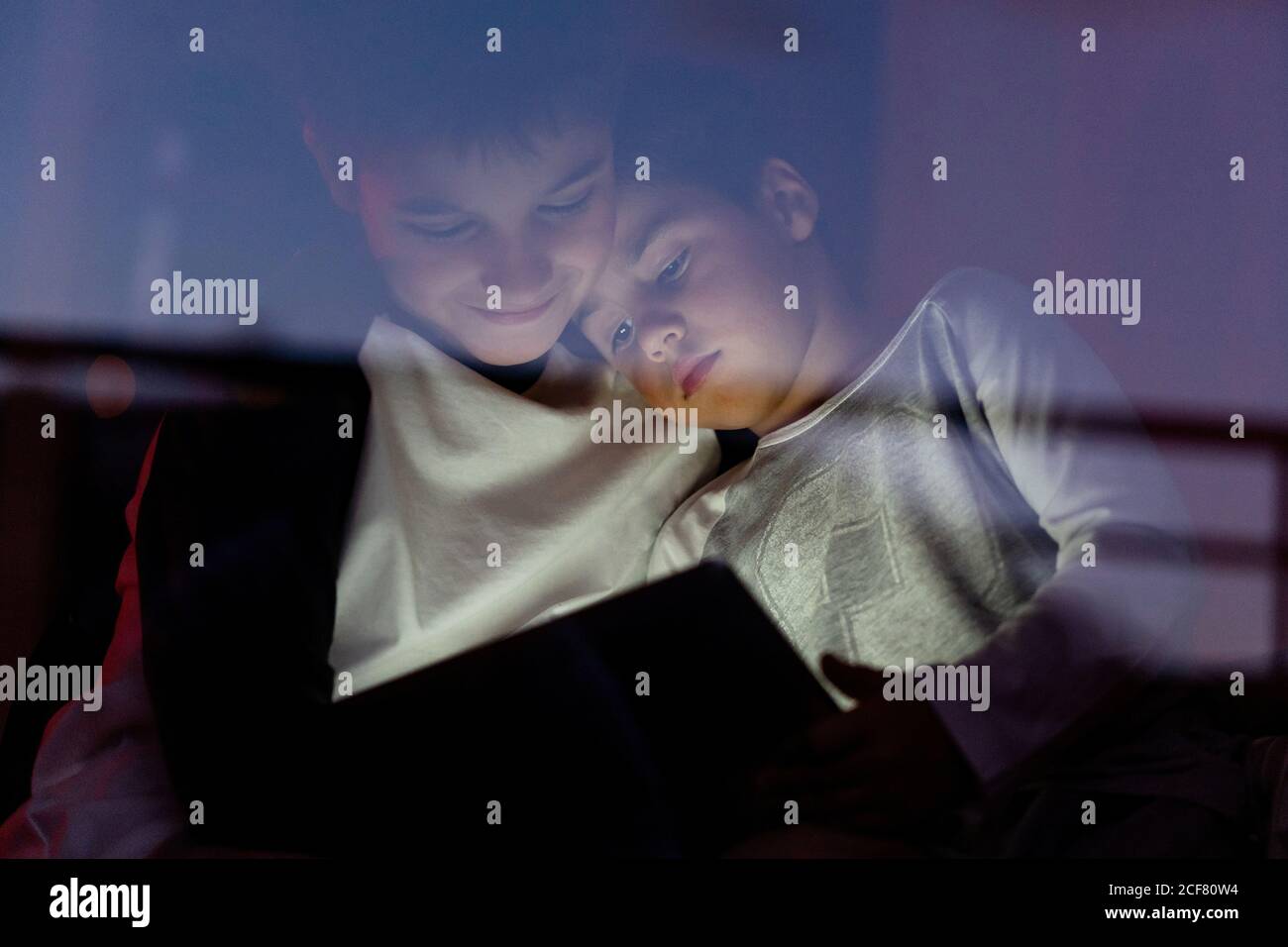 Boys cuddling hi-res stock photography and images - Alamy