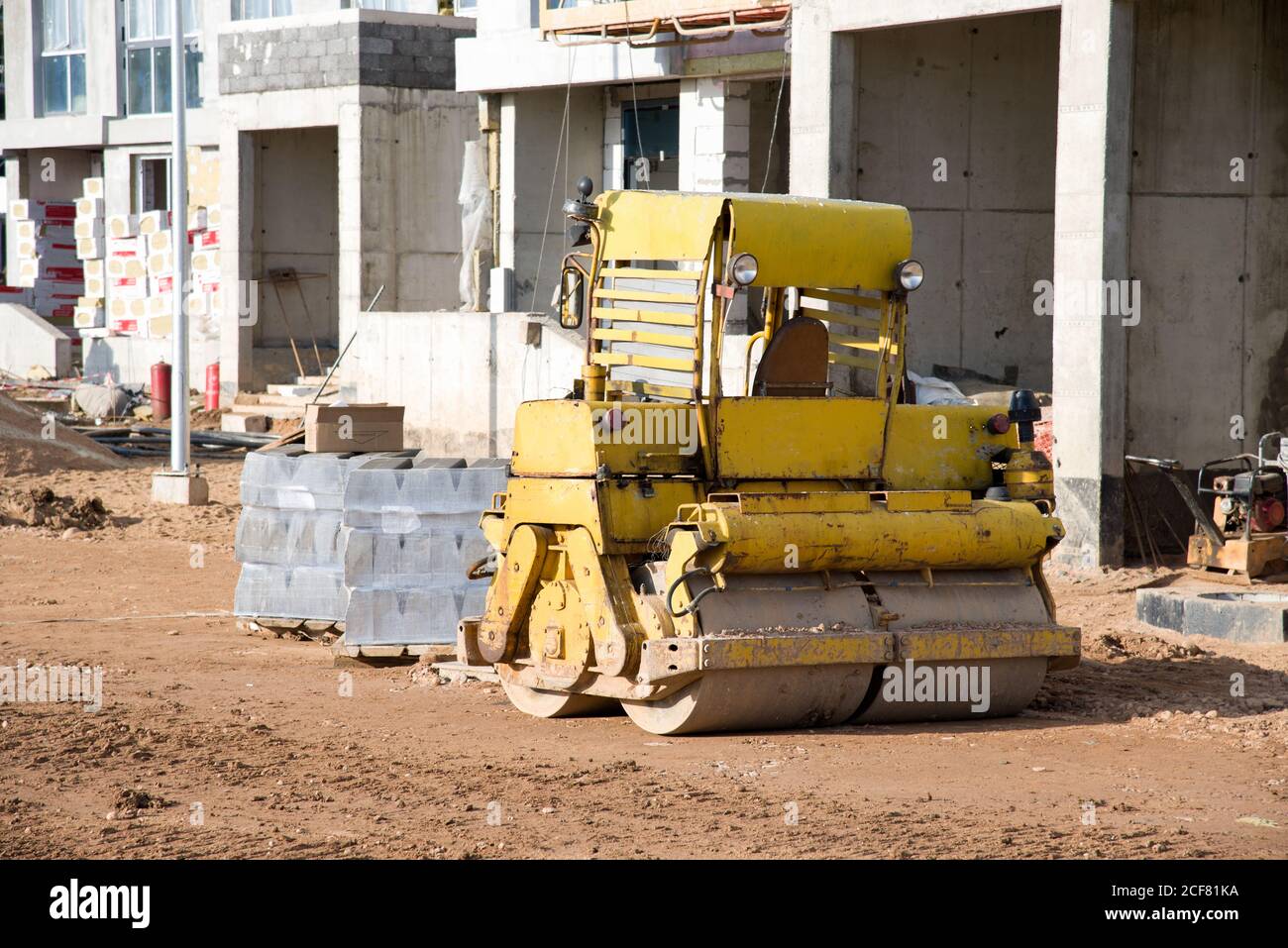 Vibration single-cylinder road roller leveling the ground for the ...