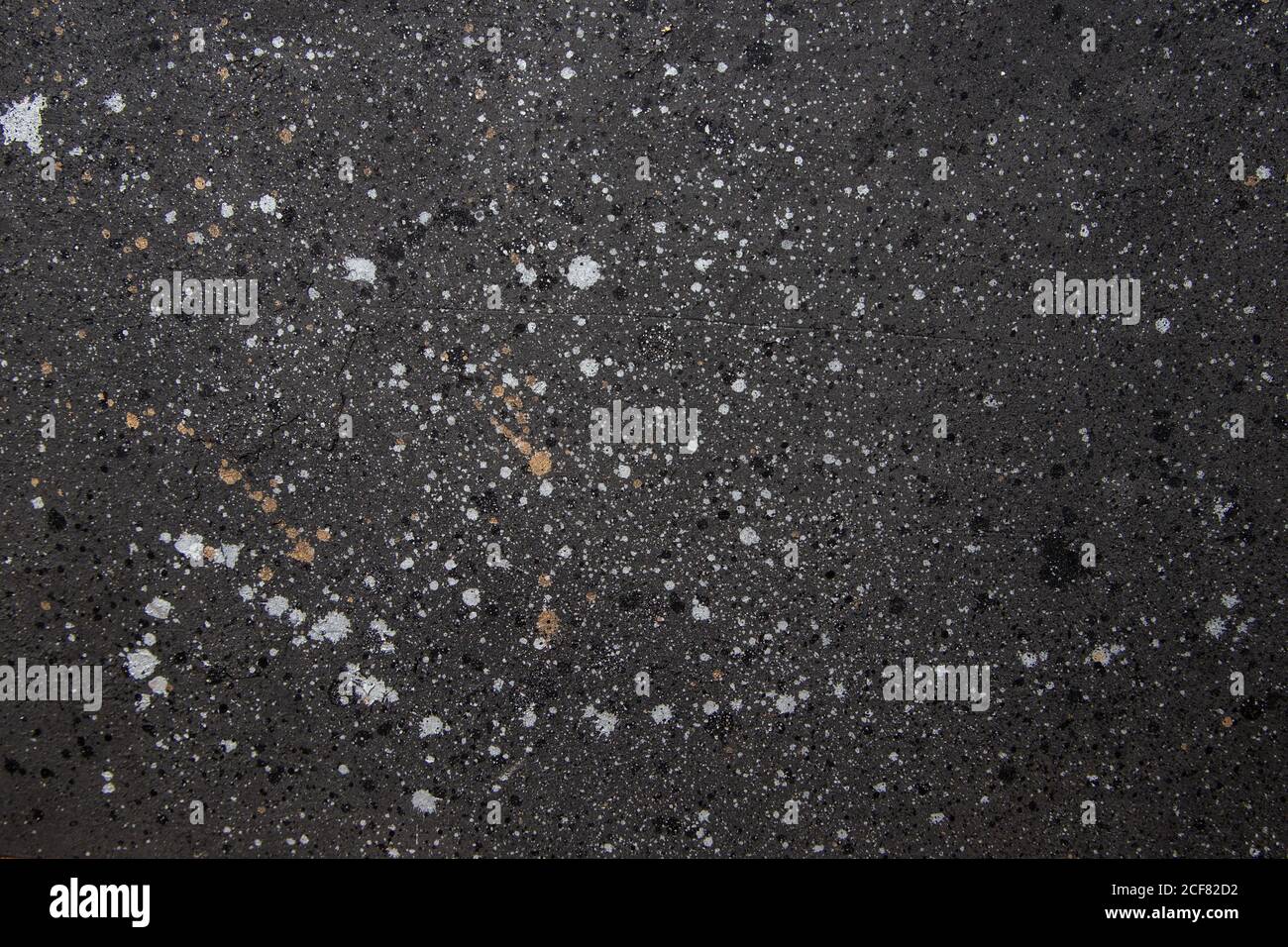 Black textured wall paint spatter gold, silver Stock Photo - Alamy
