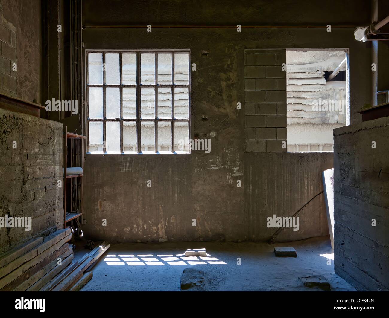 Weathered concrete reconstruction room located on territory of desolate ...