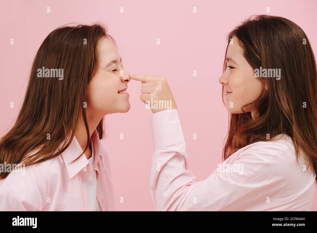 Pressing nose with finger hi-res stock photography and images - Alamy