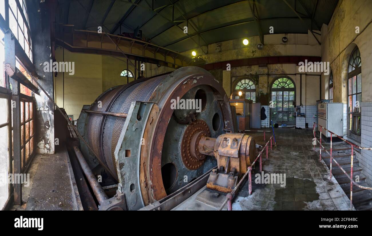 Destroyed rusty industrial circular machine with metal mechanism and ...