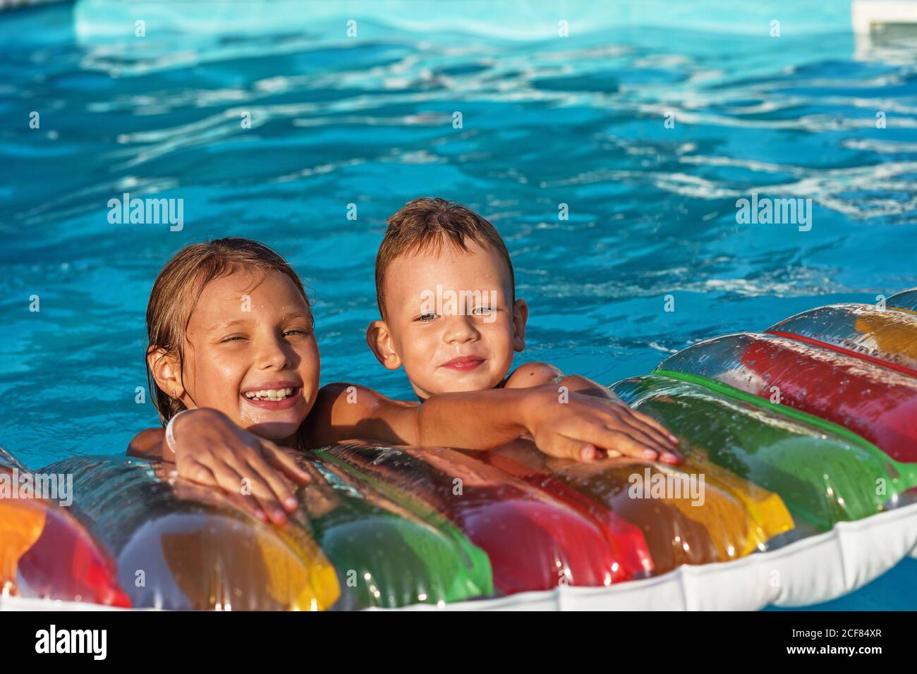 Kids playing on air mattress hi-res stock photography and images - Alamy