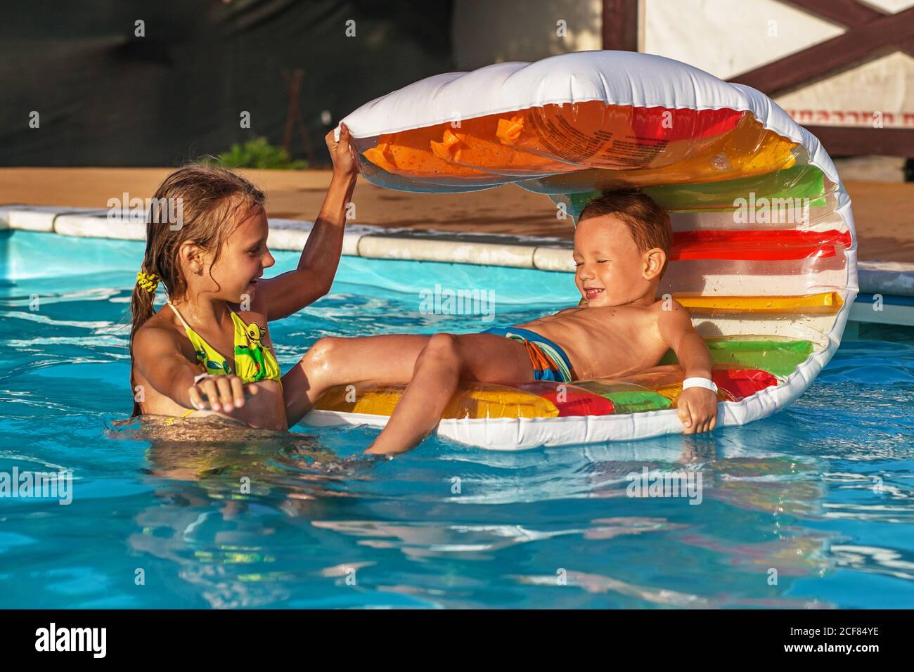 Kids playing on air mattress hi-res stock photography and images - Alamy