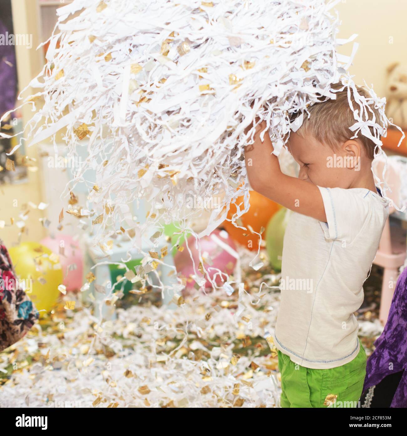 Little boy jumping and having fun celebrating birthday. Portrait of a ...