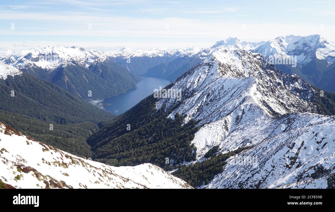 Snowy white Kepler Track during spring in Fiordland National Park of ...