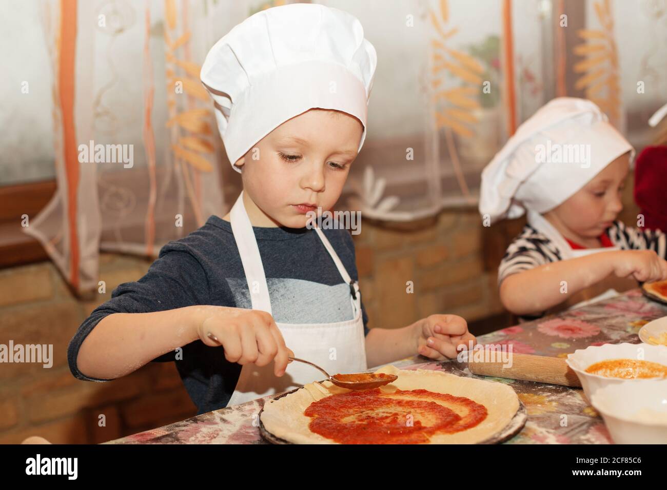 Little cook. Children make pizza. Master class for children on cooking ...