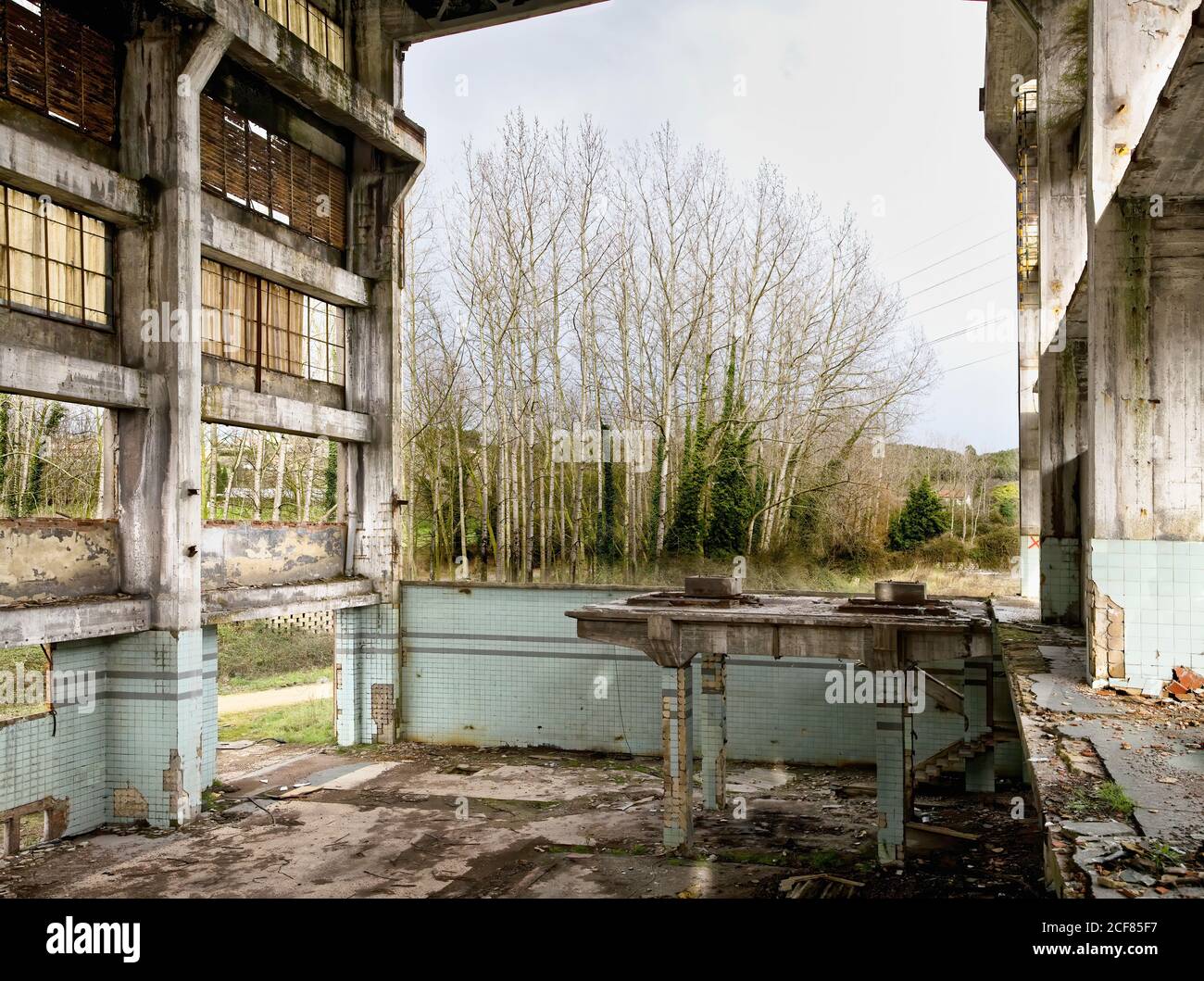 Ruins of old neglected industrial workshop with shabby walls and ...