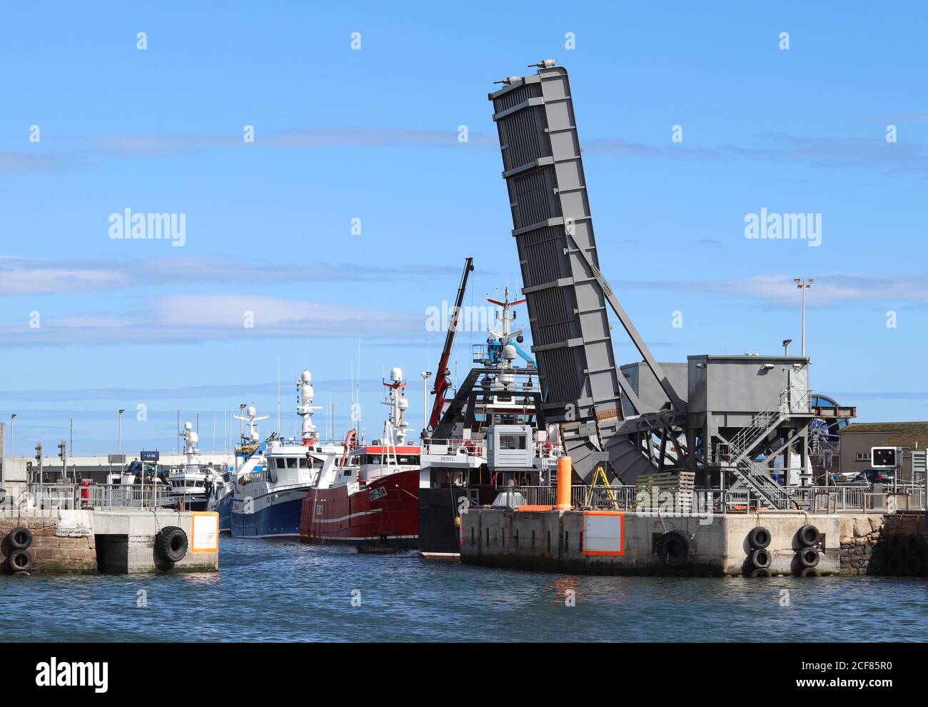 Raised bridge in Peterhead harbour Stock Photo - Alamy