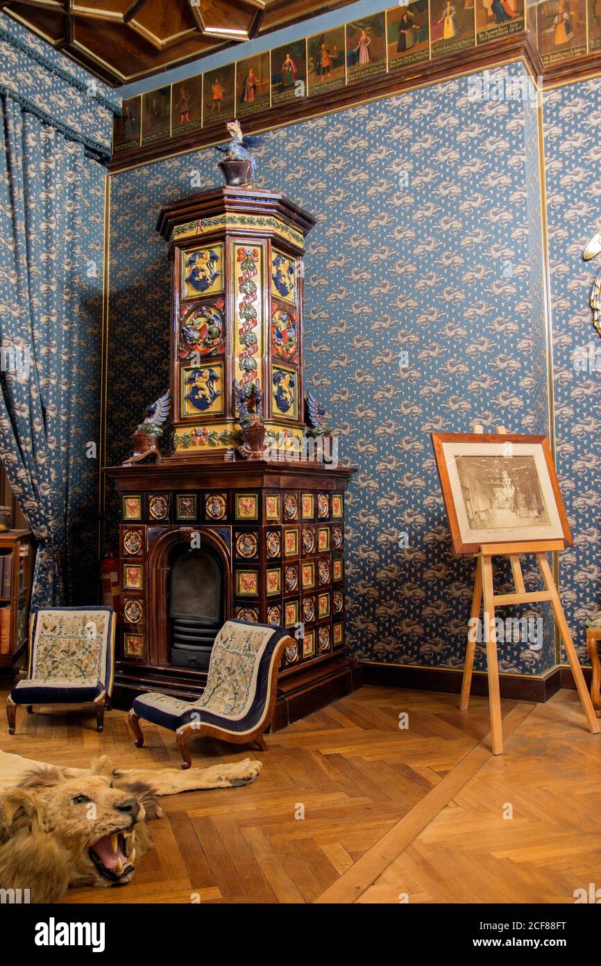 A tile stove built from hand-painted colored tiles from the Zsolnay ...