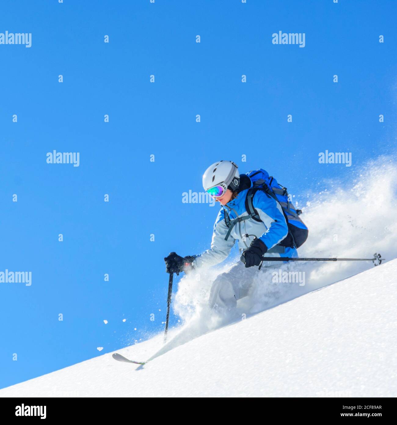 Female skier in fantastic backcountry area near Kitzbühel Stock Photo ...