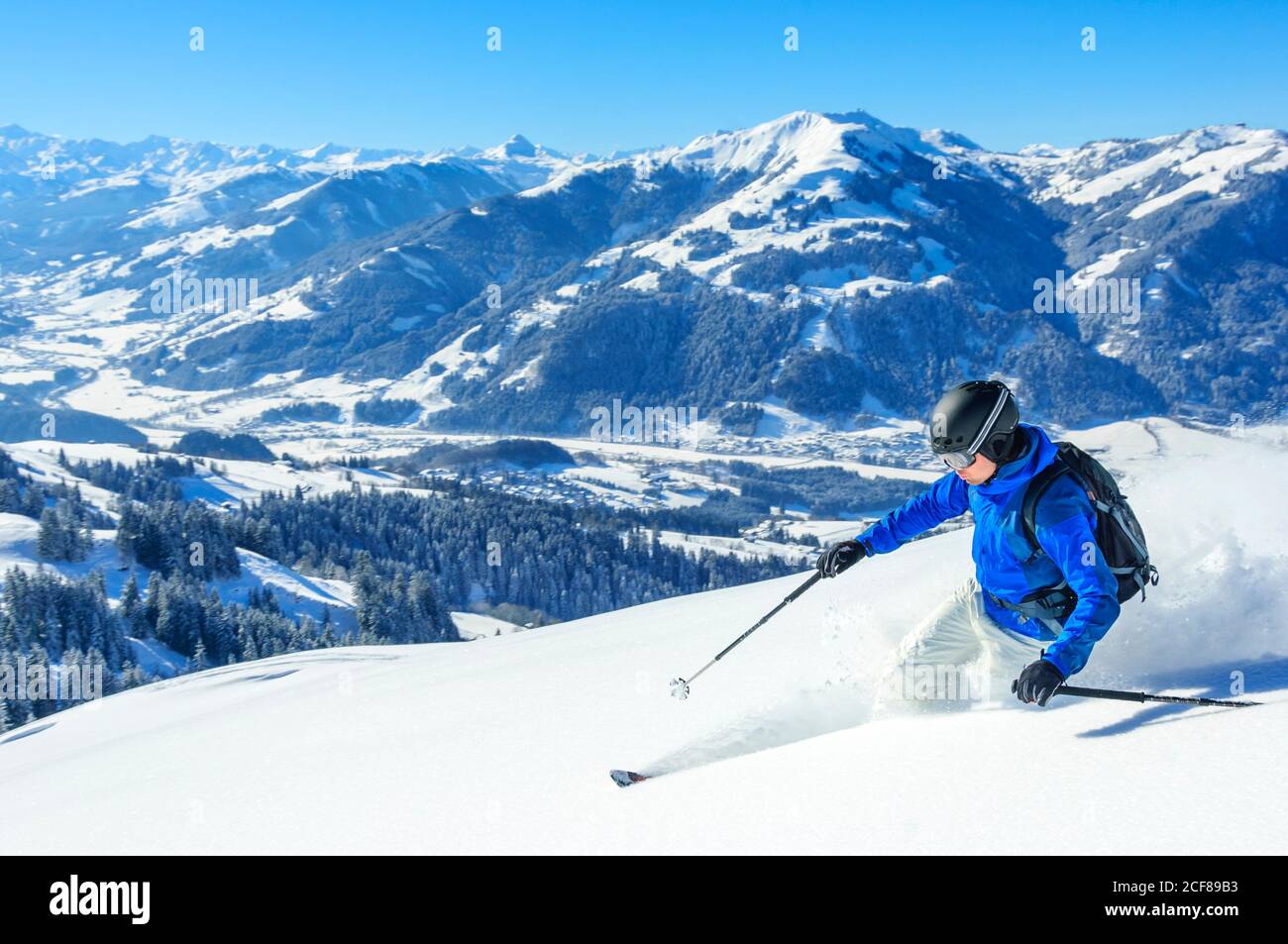 Freeriders in fresh powder snow Stock Photo - Alamy