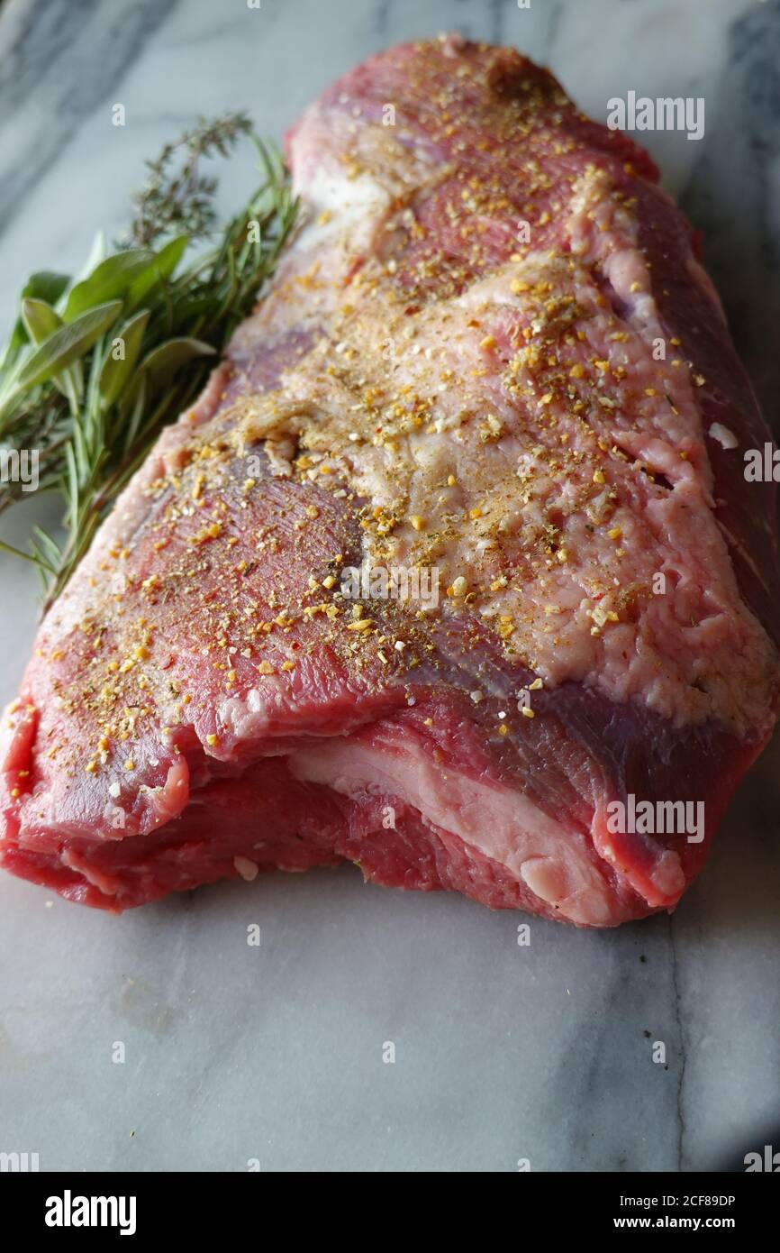 seasoned raw Beef trip tip steak Stock Photo - Alamy