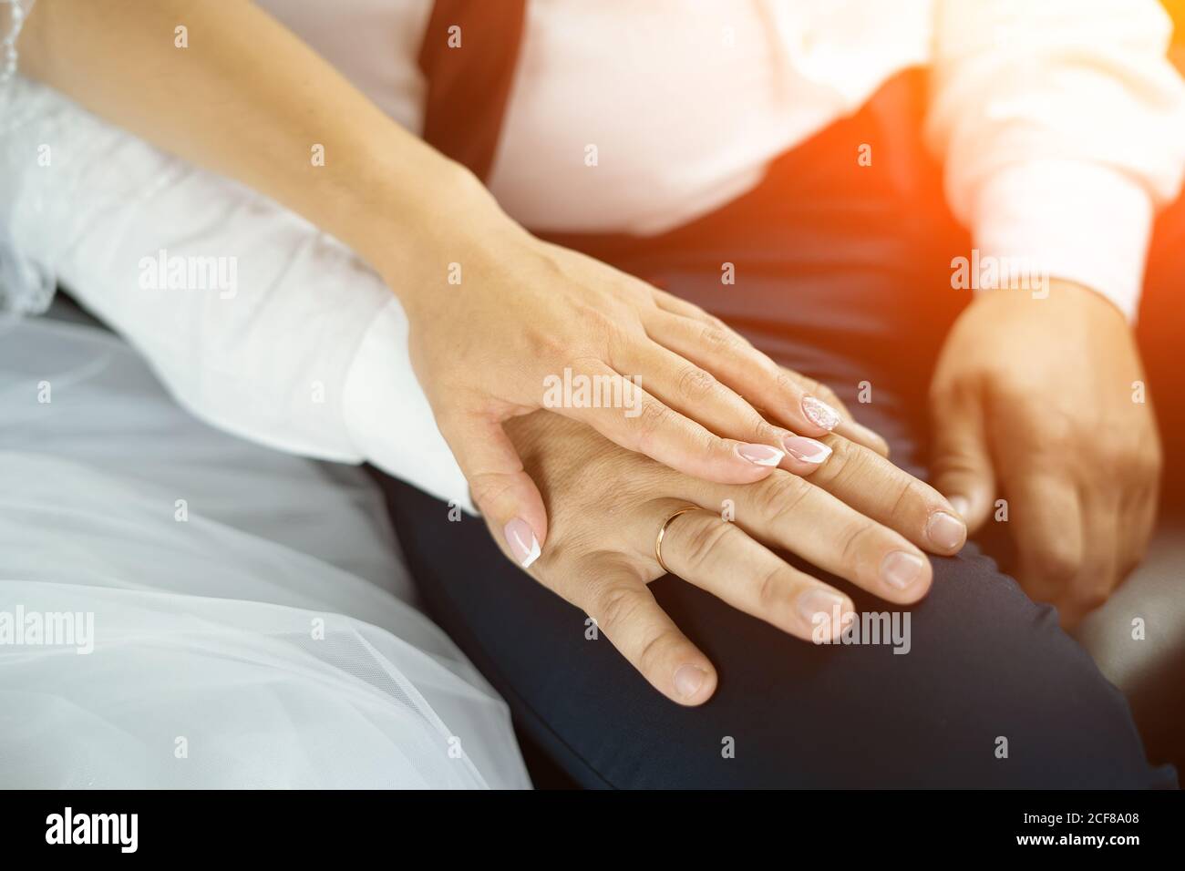 Grooms hand hi-res stock photography and images - Alamy