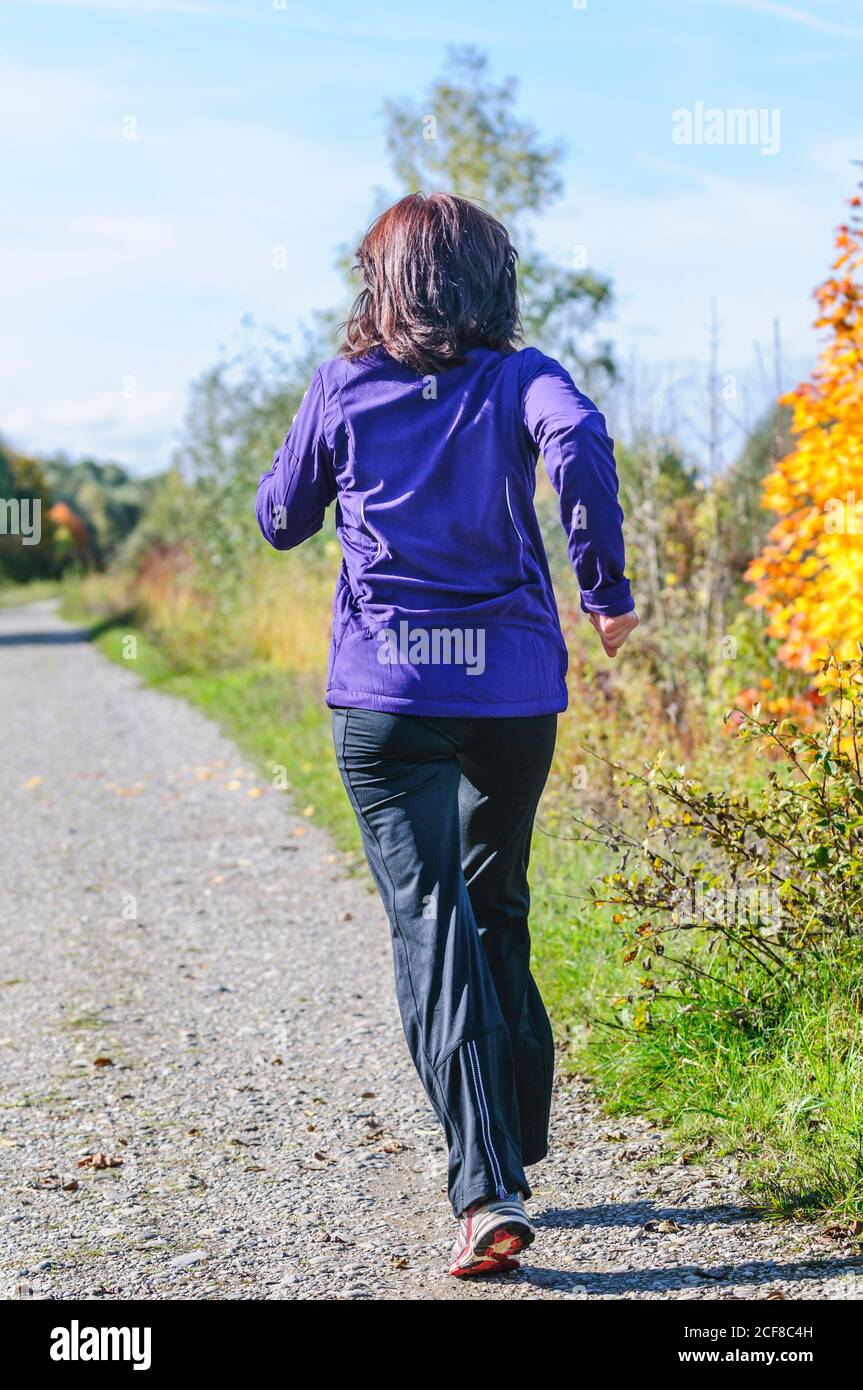Woman powerful walking hi-res stock photography and images - Alamy
