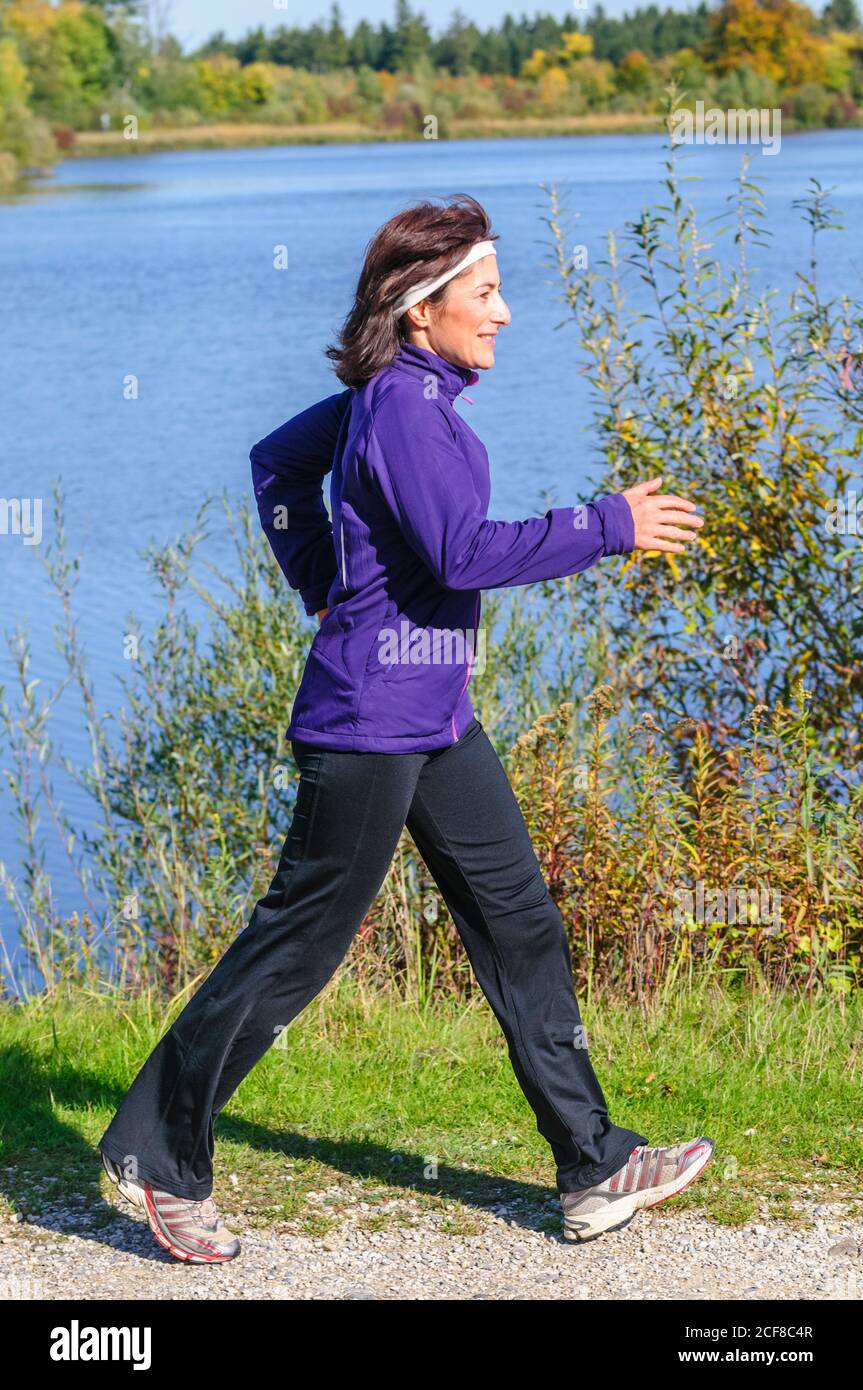 Woman powerful walking hi-res stock photography and images - Alamy