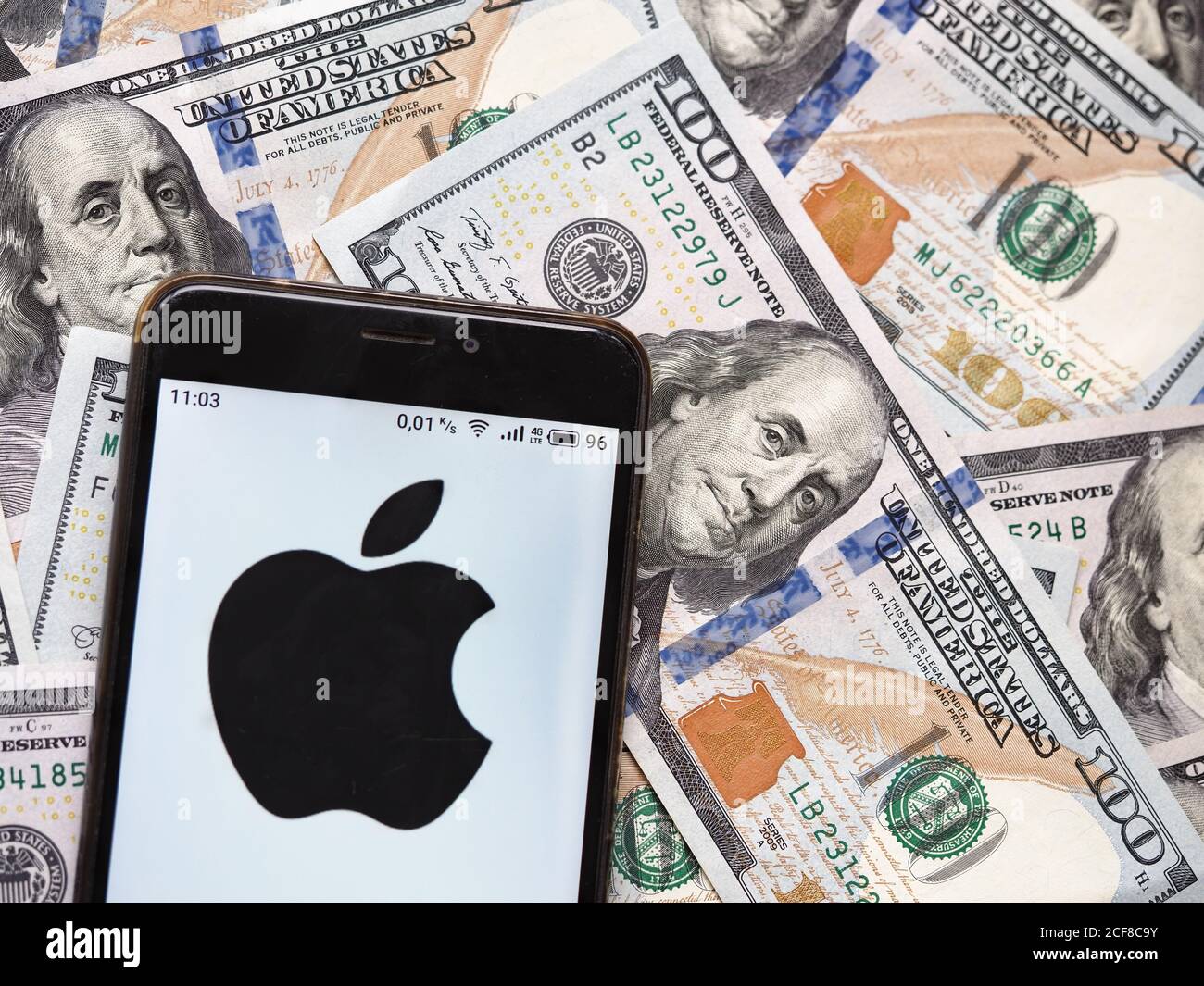 In this photo illustration an Apple Inc. logo is seen displayed on a ...