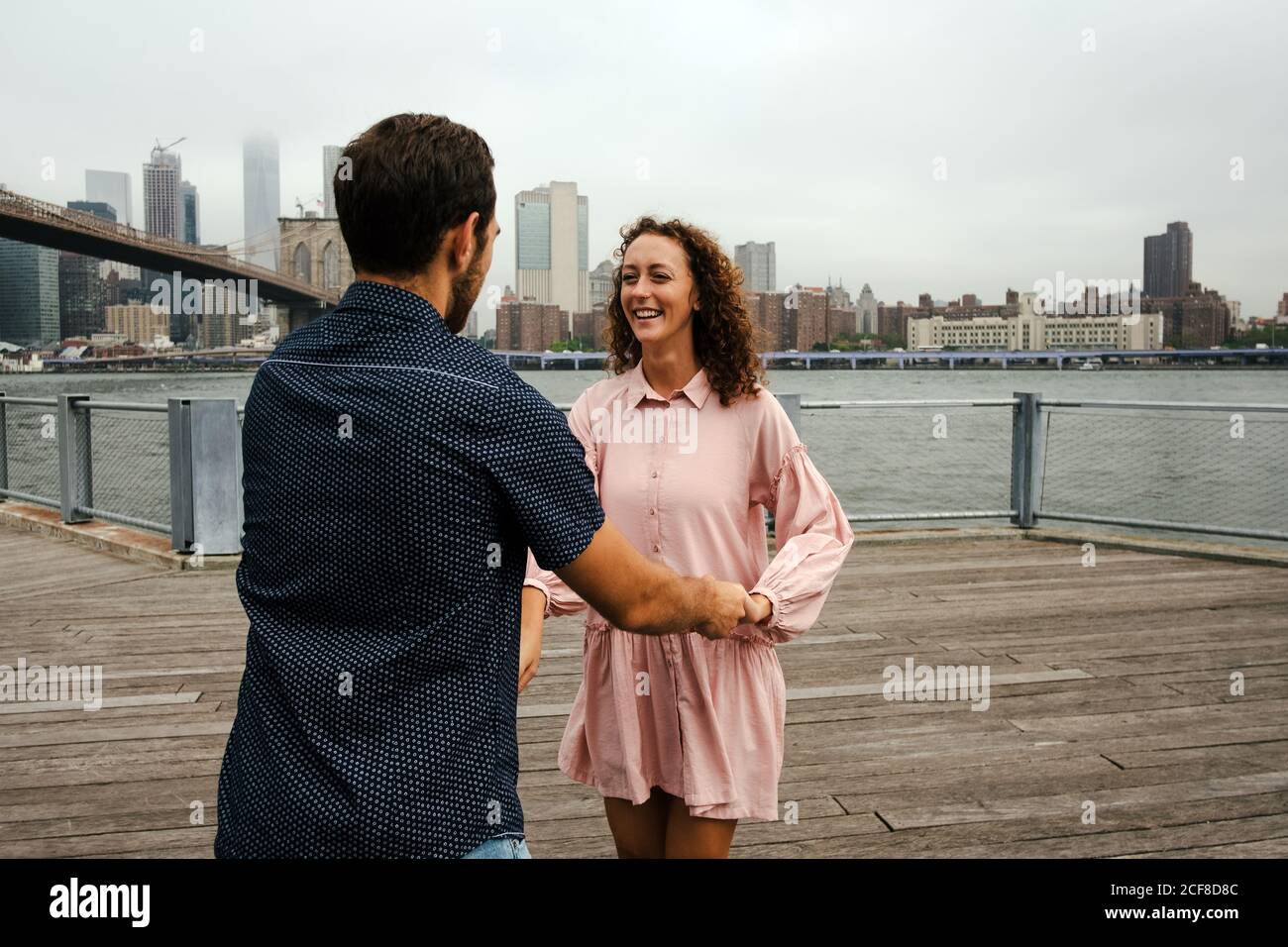 Couple dancing near water cheerful hi-res stock photography and images ...