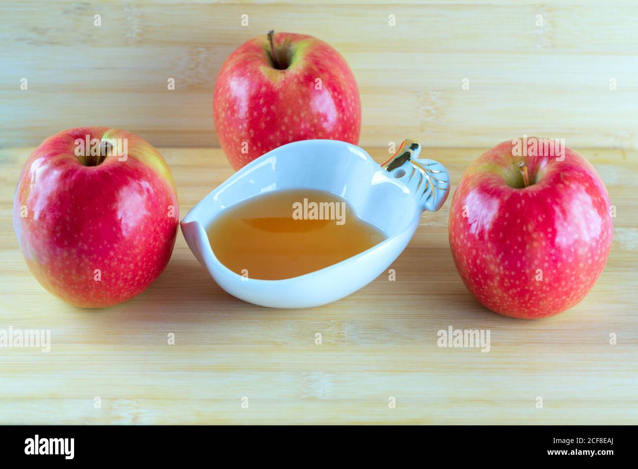 Jewish holiday Rosh Hashana background with honey and apple on wooden ...