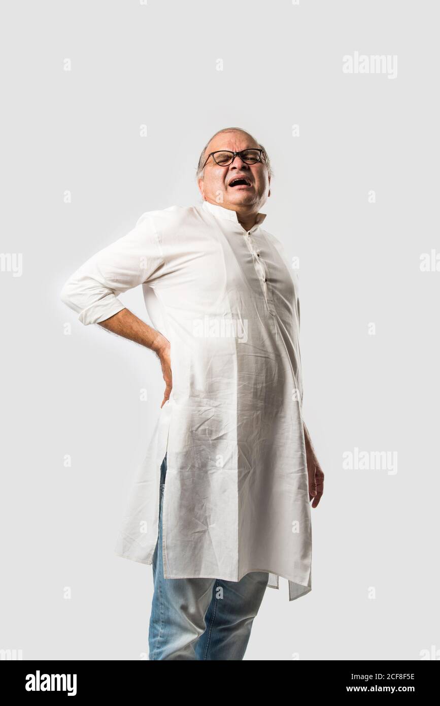 Indian asian old man having pain or ache in different body parts, sad ...
