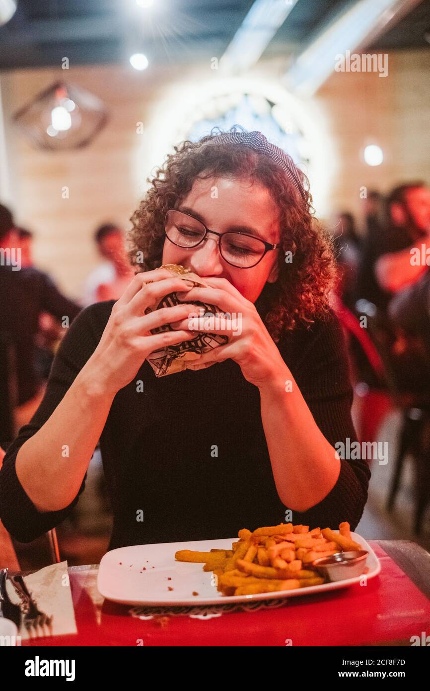 Sitting at diner table hi-res stock photography and images - Alamy