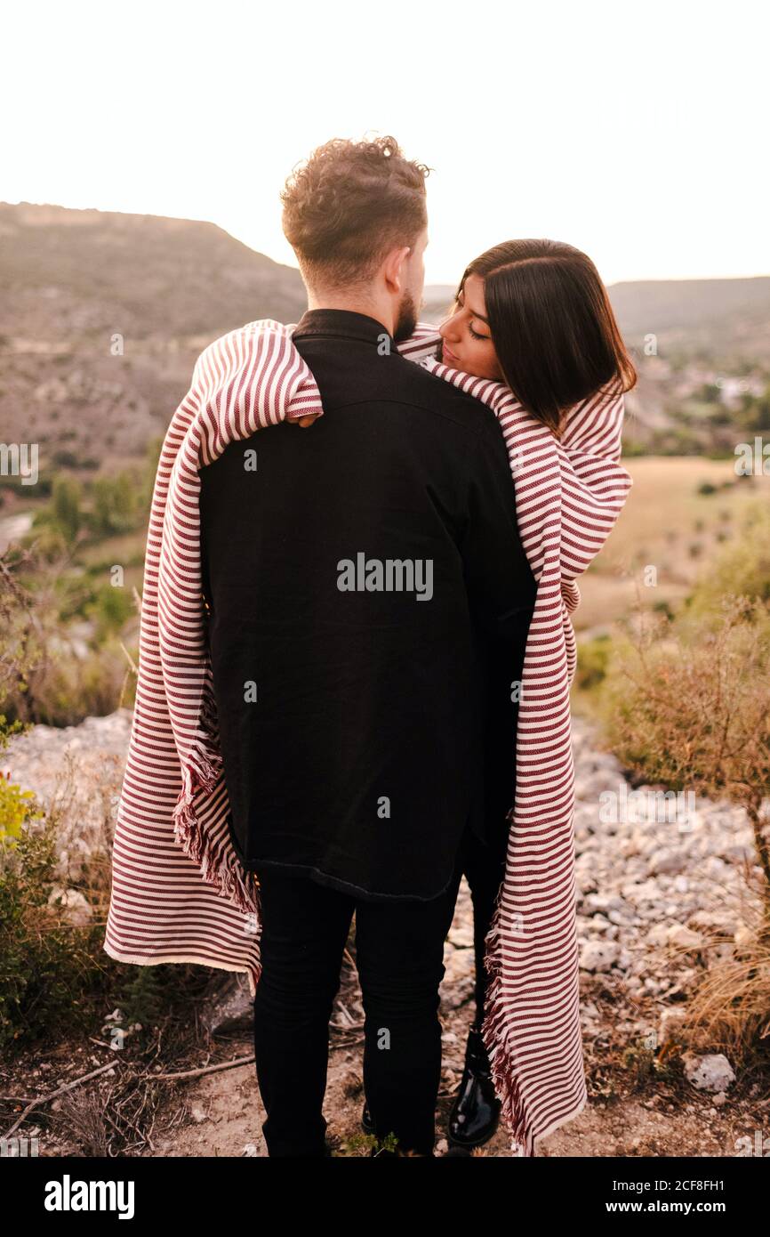 Boyfriend And Girlfriend Hugging Side View Of Boyfriend Lifting