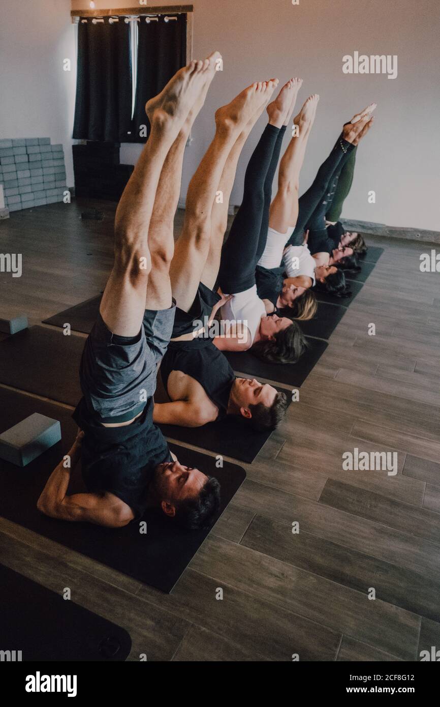 Raised legs pose hi-res stock photography and images - Alamy