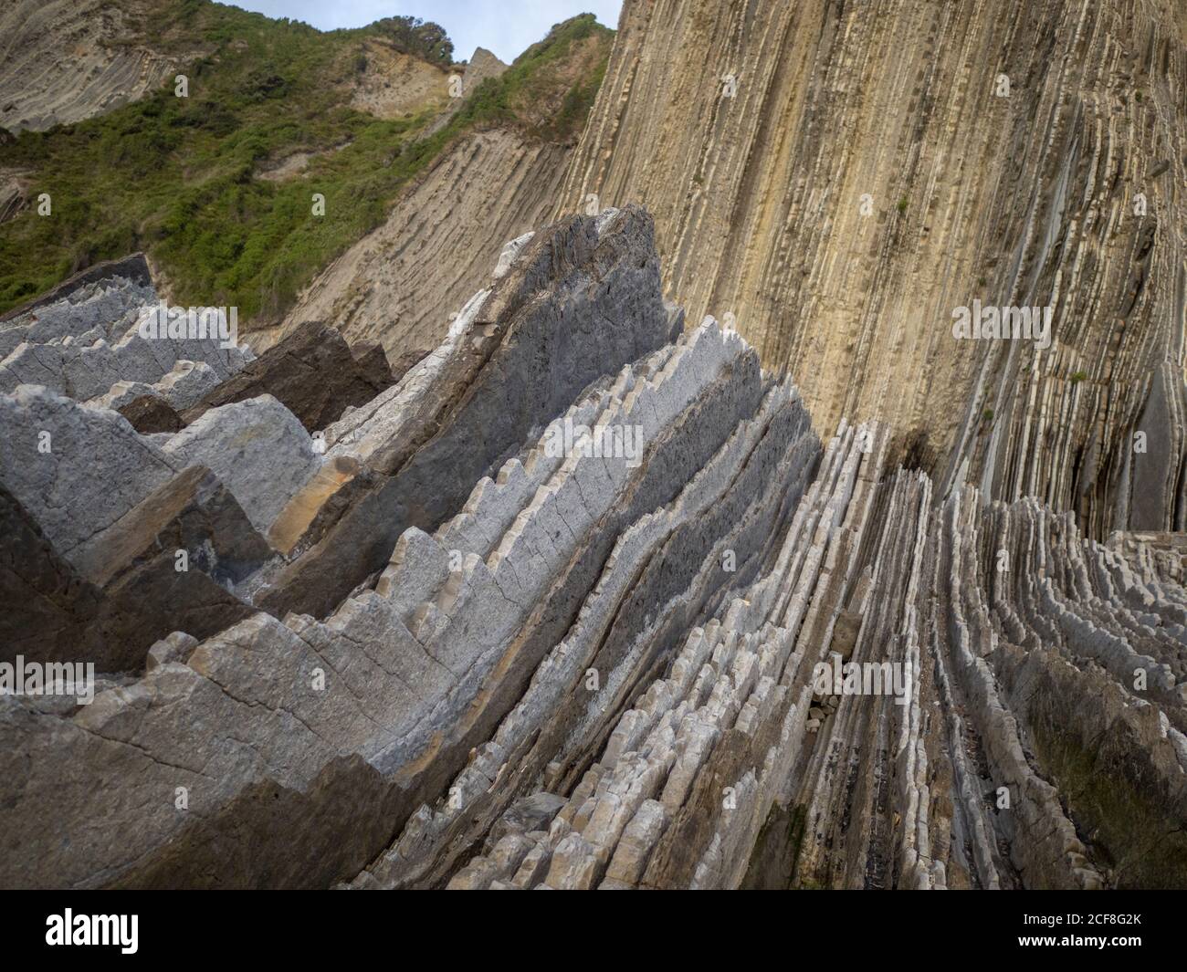 Closeup of rock formations and cliffs on a beach at daytime Stock Photo ...