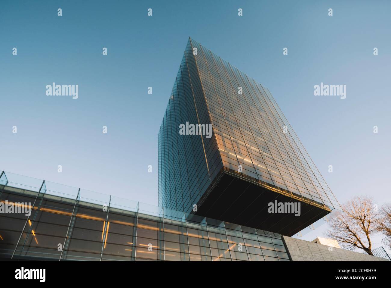 Modern glassy office building reflecting hi-res stock photography and ...