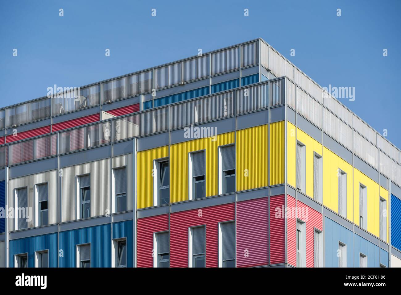 Exterior of contemporary colorful urban house with long half opened ...