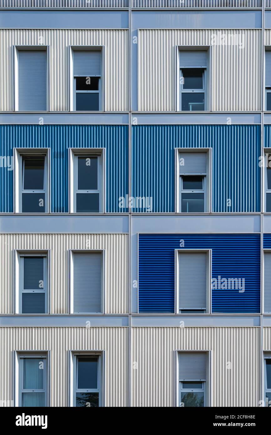 Exterior of contemporary colorful urban house with long half opened ...