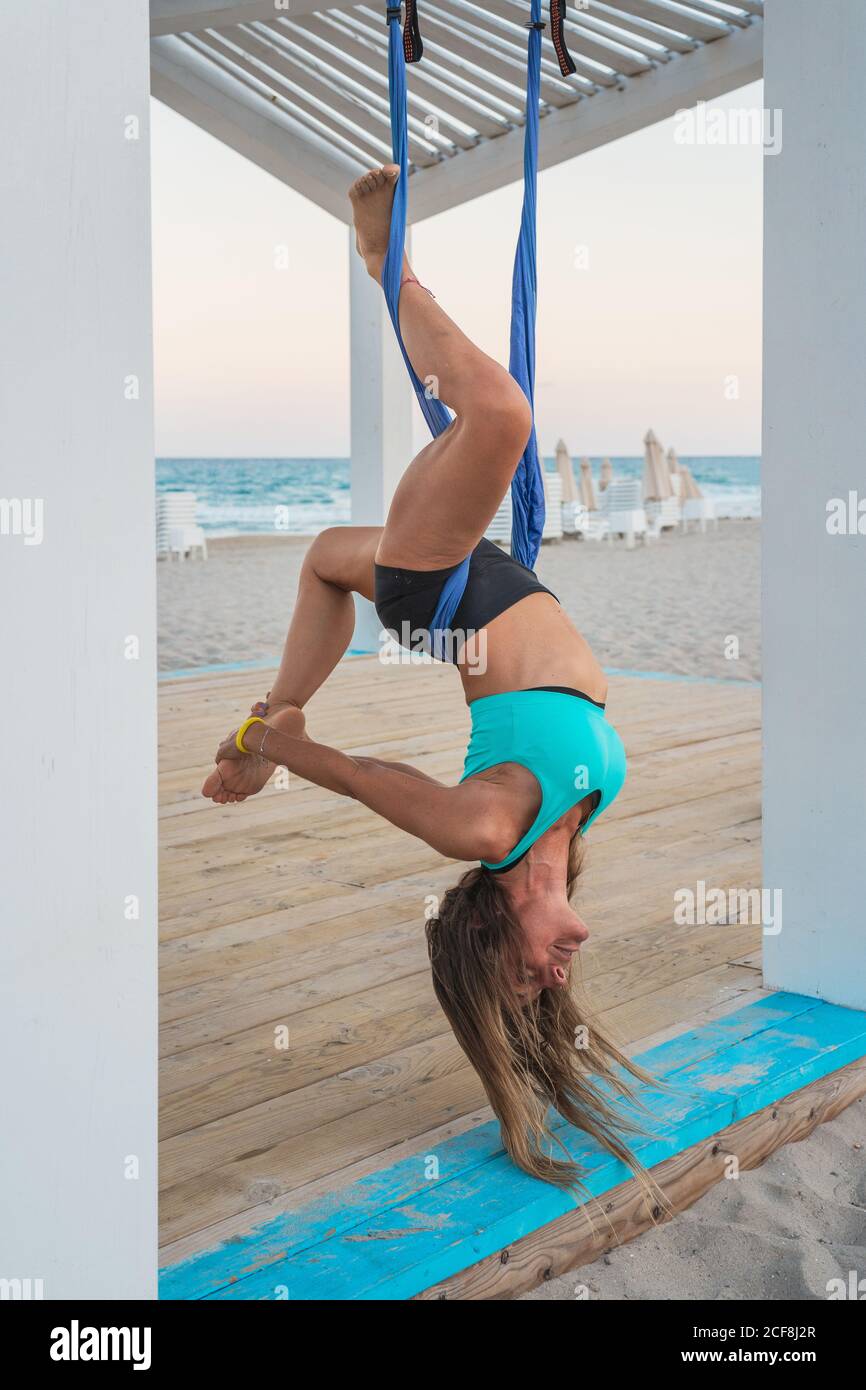 Hanging Upside Down By One Leg