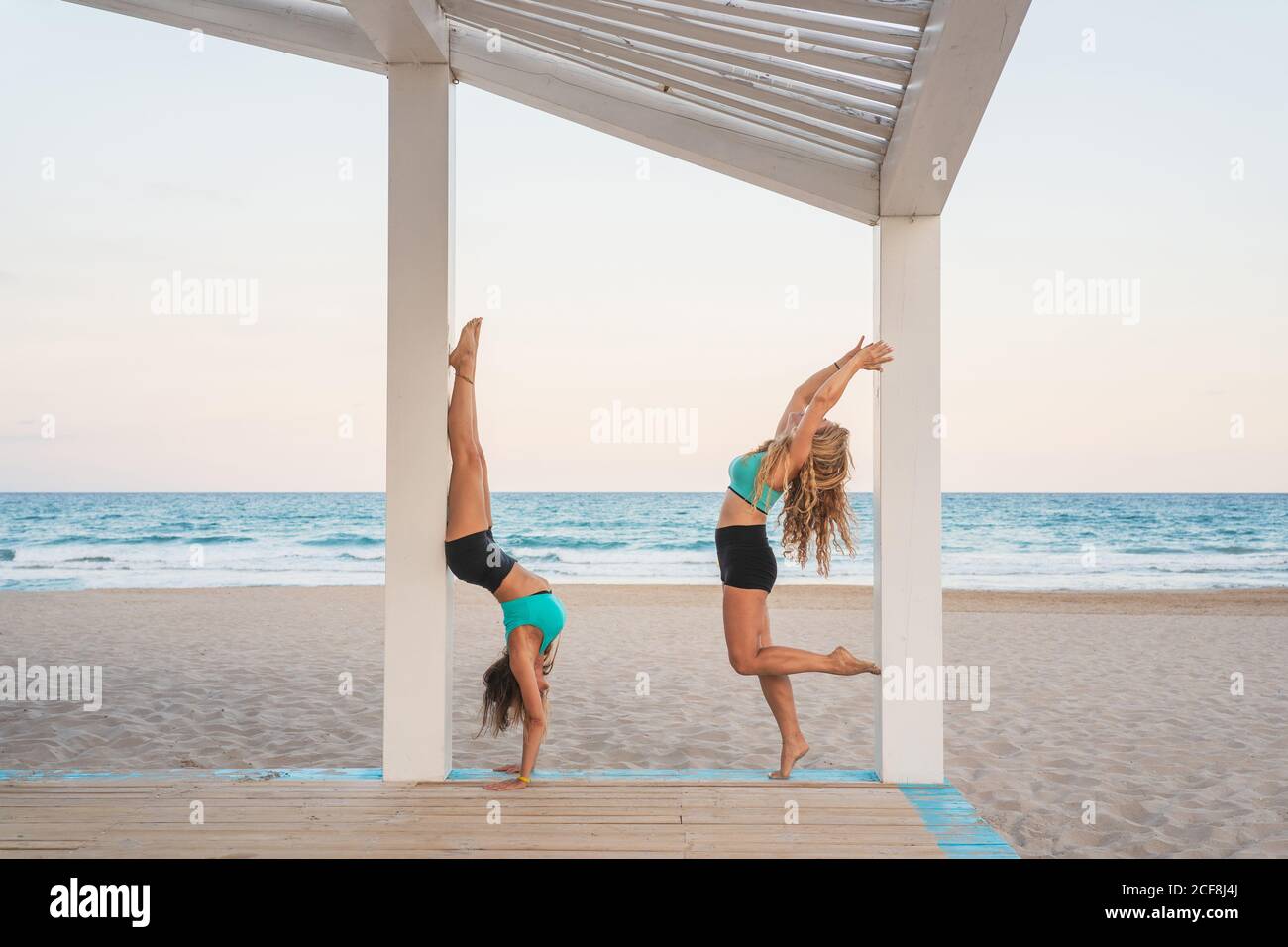 Handstand on beach hi-res stock photography and images - Alamy
