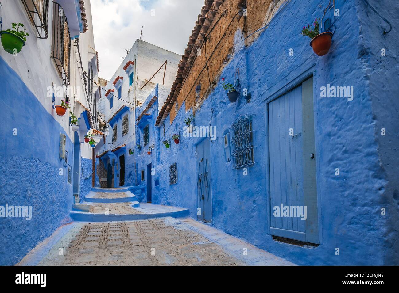 Famous blue city walls of Chefchaouen, Morocco Stock Photo - Alamy
