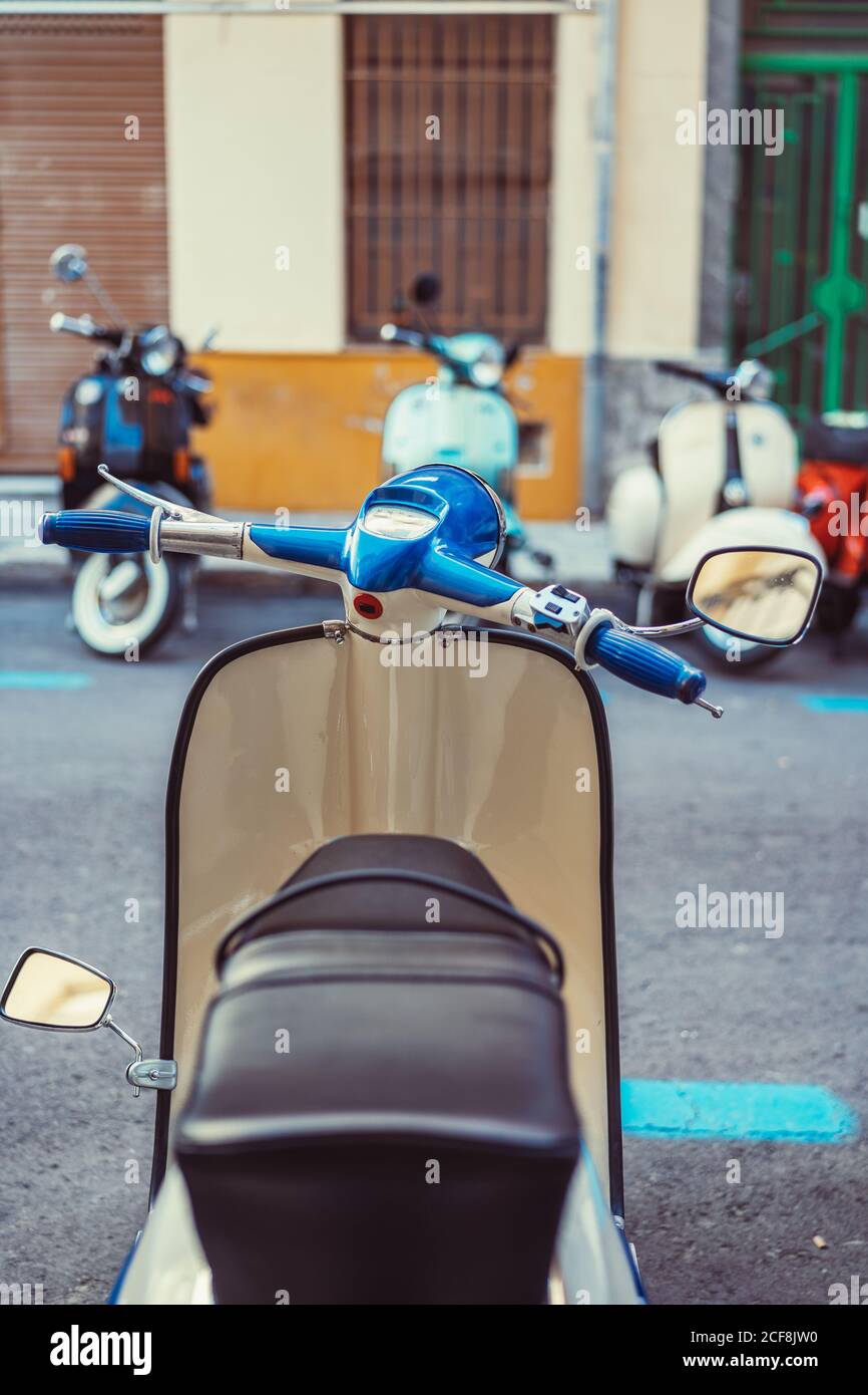 Vintage shiny motorcycle with clean mirror parked on asphalt road on ...